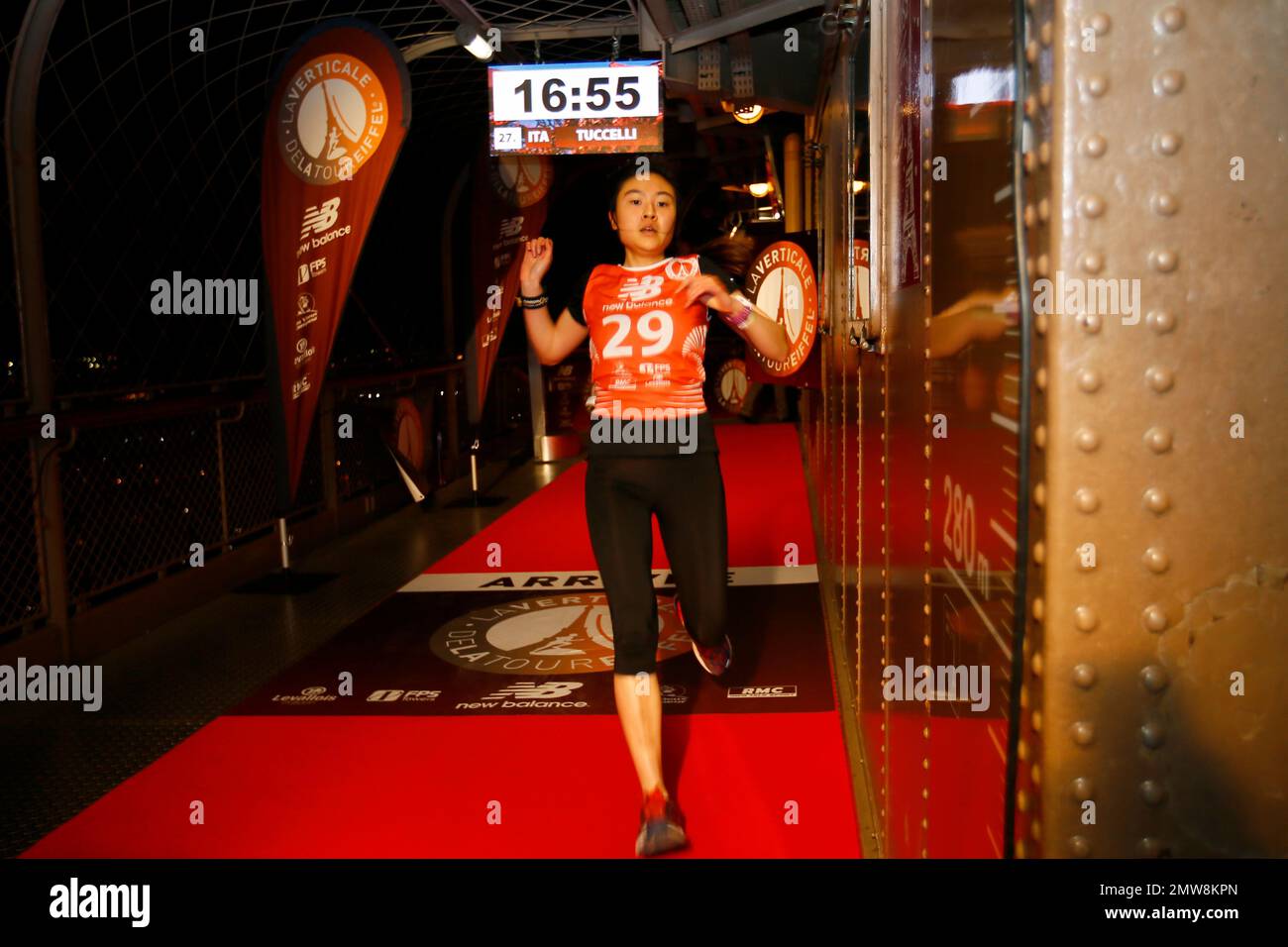 Michelle Ko of Canada crosses the finish line during the third edition ...