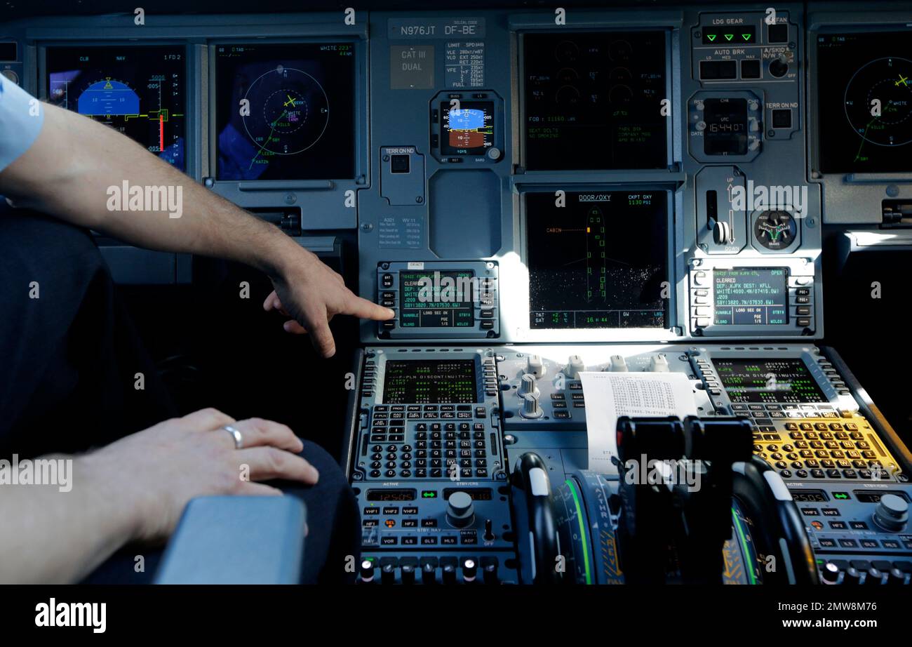 Pilot David Dishman explains some features of a Jet Blue aircraft at ...