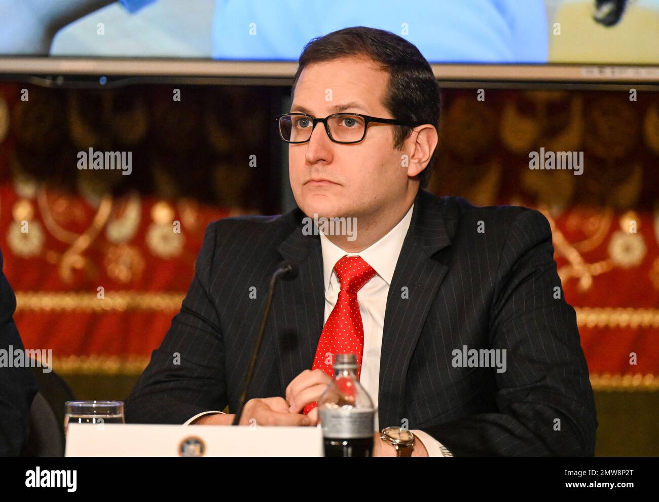 Micah Lasher, Director of Policy for Governor Kathy Hochul listens as ...