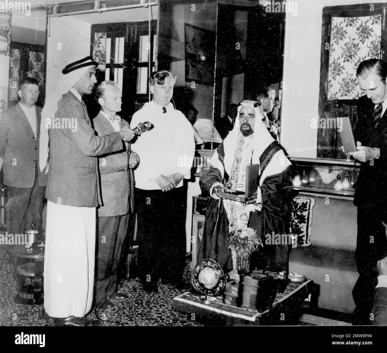 The ruler of Bahrain, Khalifa bin Salman Al Khalifa (seated) is seen ...