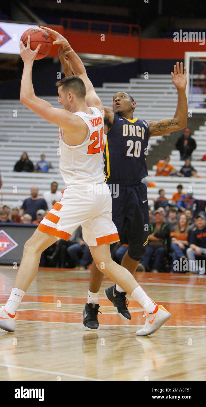 Syracuse's Tyler Lydon, left, and UNC Greensboro's Diante Baldwin ...