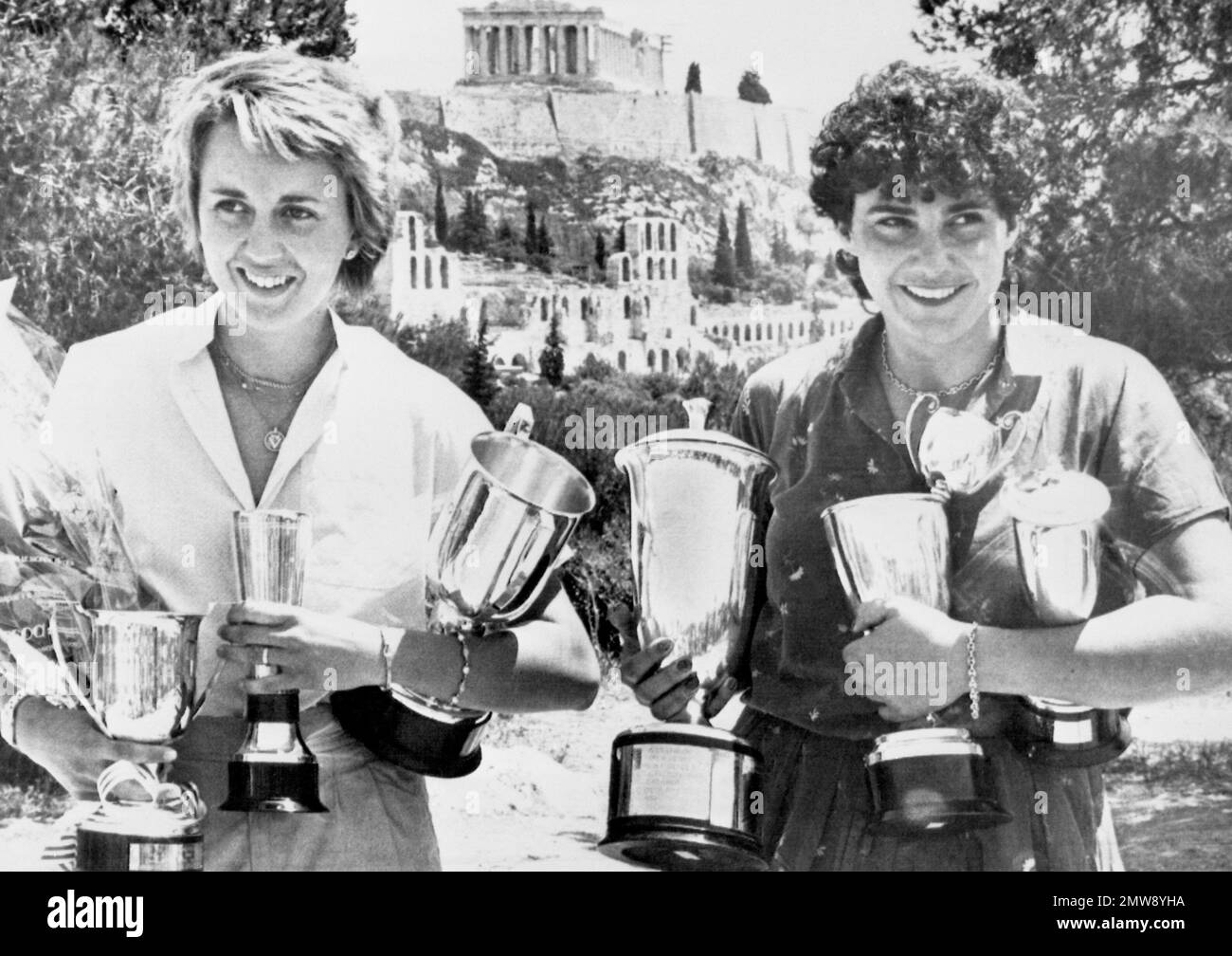 Michele Mouton, of France, right, holding her winner's Cups for winning ...