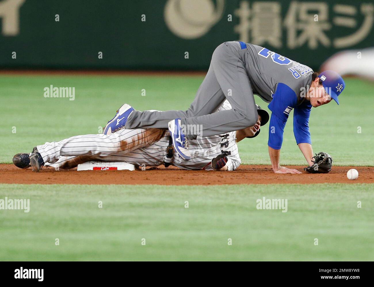 Japan's Seiya Suzuki steal second as Israel's second baseman Tyler ...