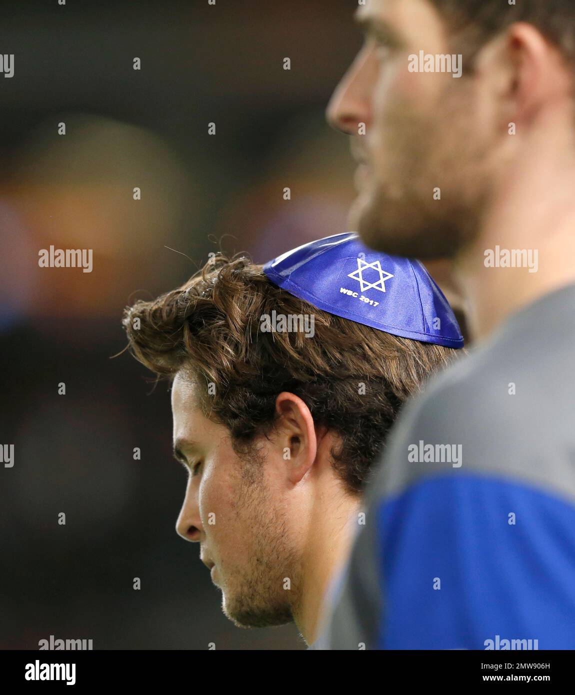 Israel's second baseman Tyler Krieger, left, listens to his national ...