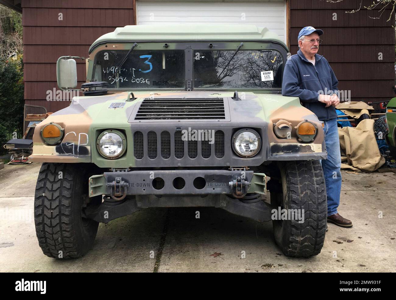 Hank Porter, 75, Mayor of Stayton, Ore., stands with his 1990 military ...