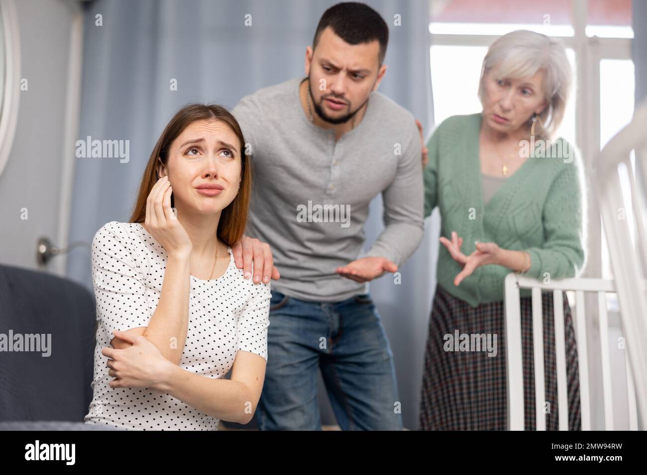 Young woman scolding crying hi-res stock photography and images - Alamy