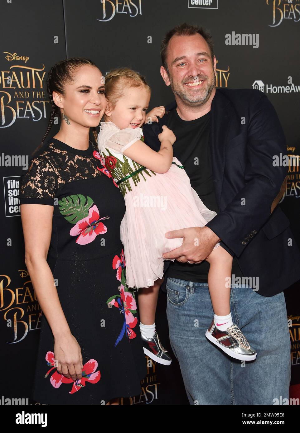 Trey Parker, left, and Boogie Tillmon and their daughter attend a ...