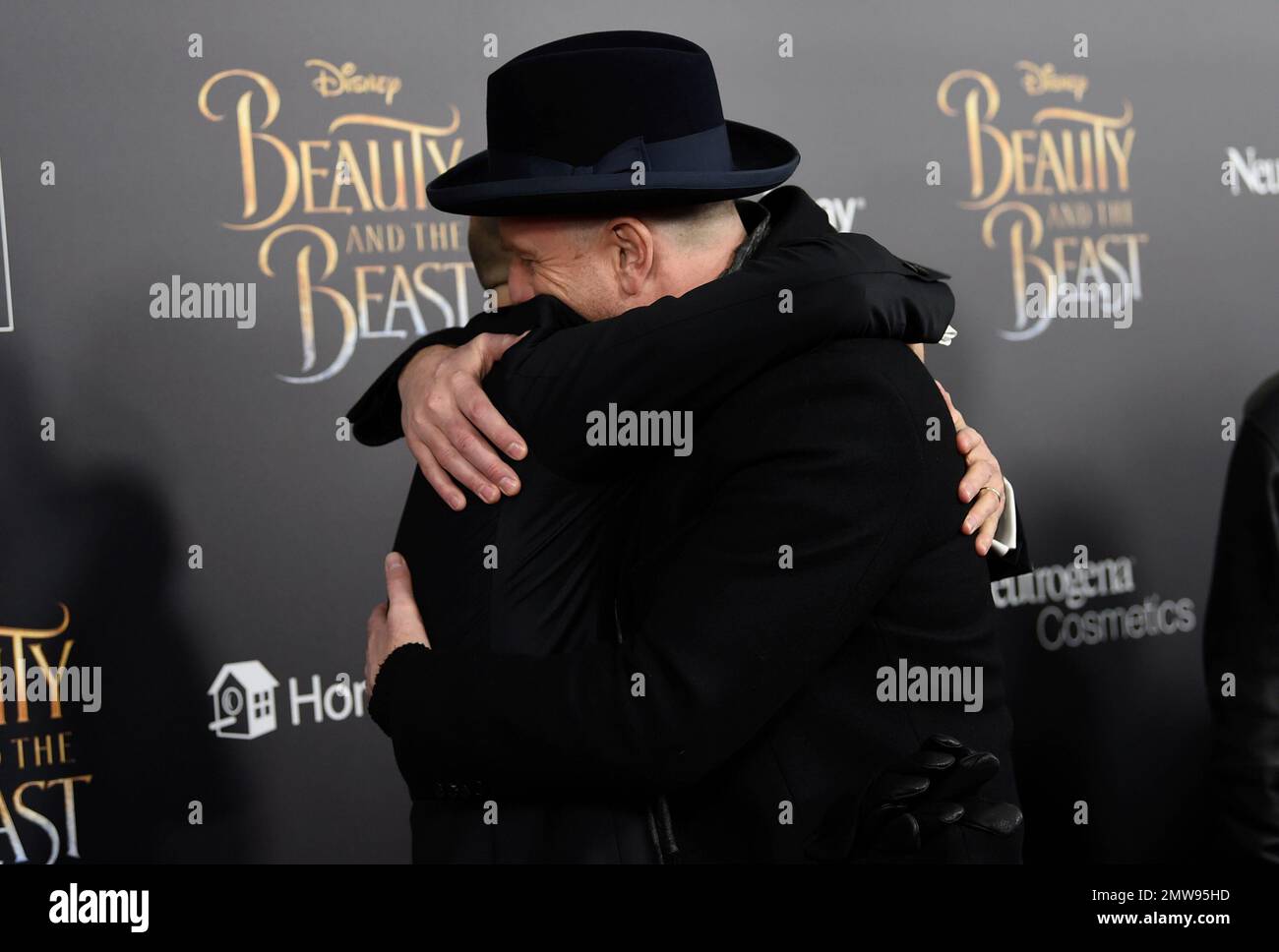 Actors Stanley Tucci, left, and Ewan McGregor greet each other at a ...