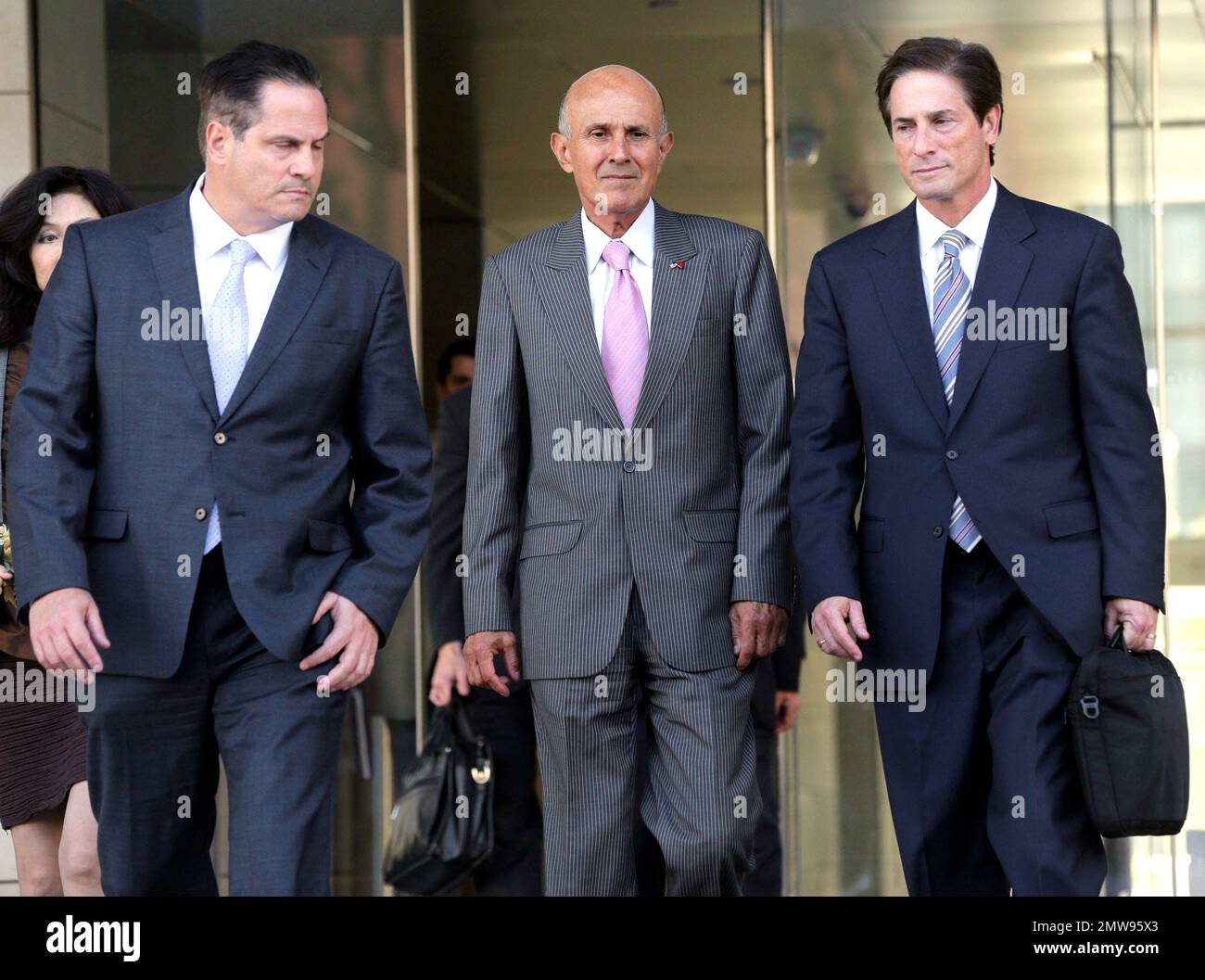 Former Los Angeles County Sheriff Lee Baca, center, leaves federal ...