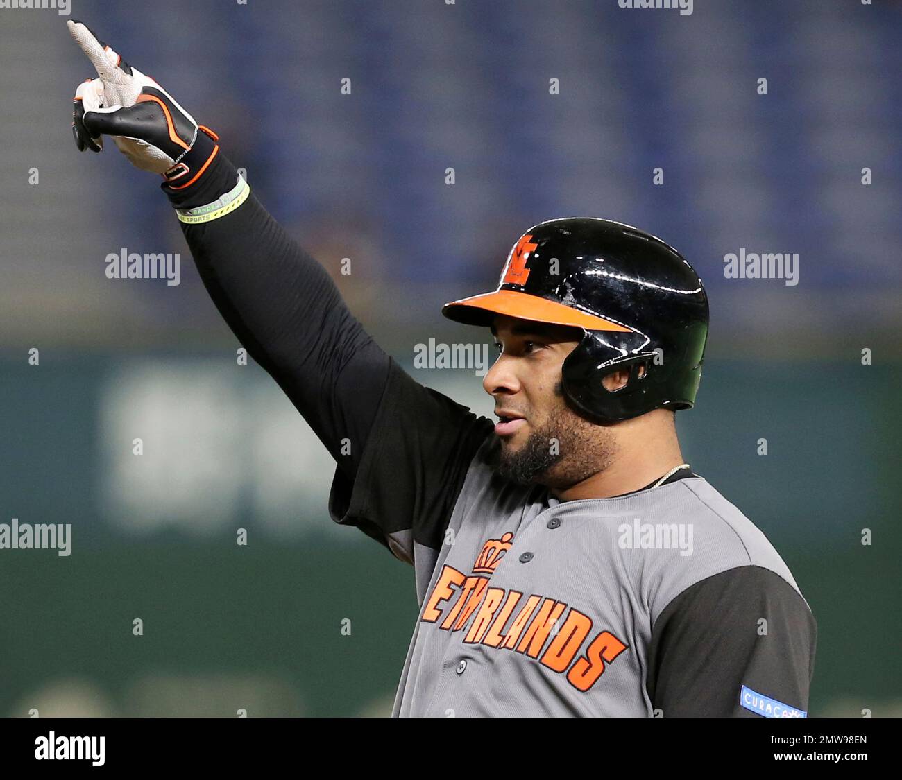 Netherlands' Wladimir Balentien reacts at first base after hitting an ...