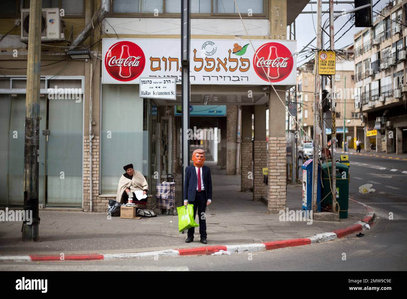 An Ultra-Orthodox Jewish child wears U.S. President Donald Trump's mask ...
