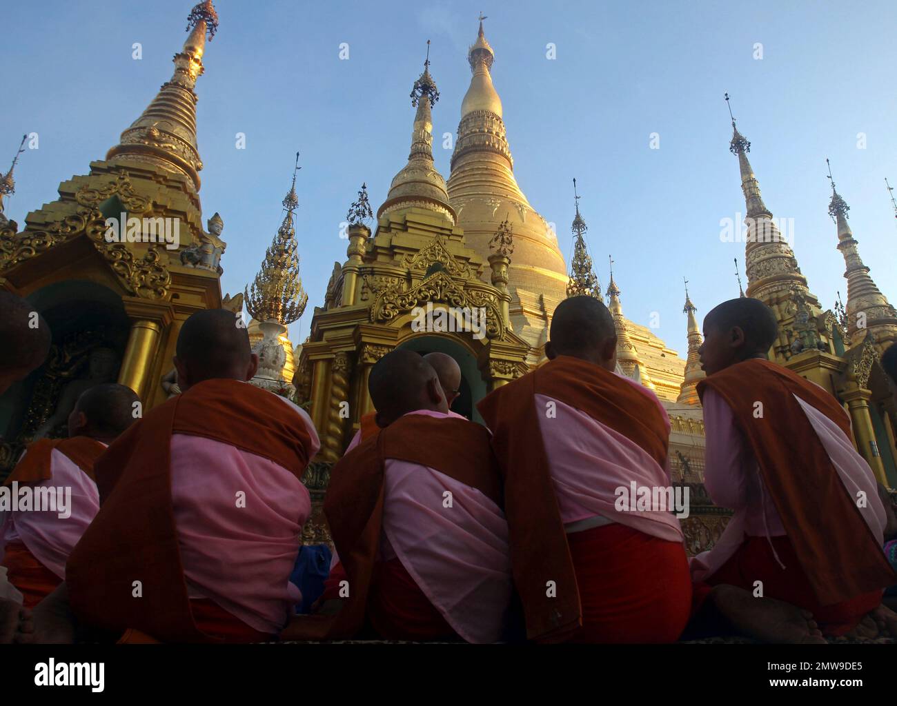 Buddhist nuns pray at Myanmar famous Shwedagon pagoda on the full moon ...