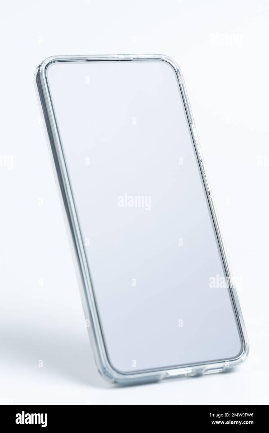 Smartphone in transparent cover in vertical view isolated Stock Photo ...