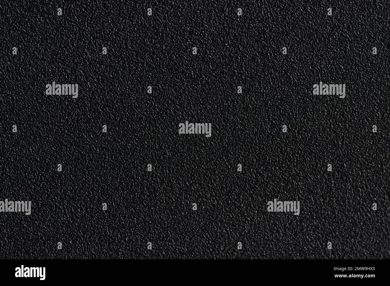 Shiny textured black metal surface background close up view Stock Photo ...
