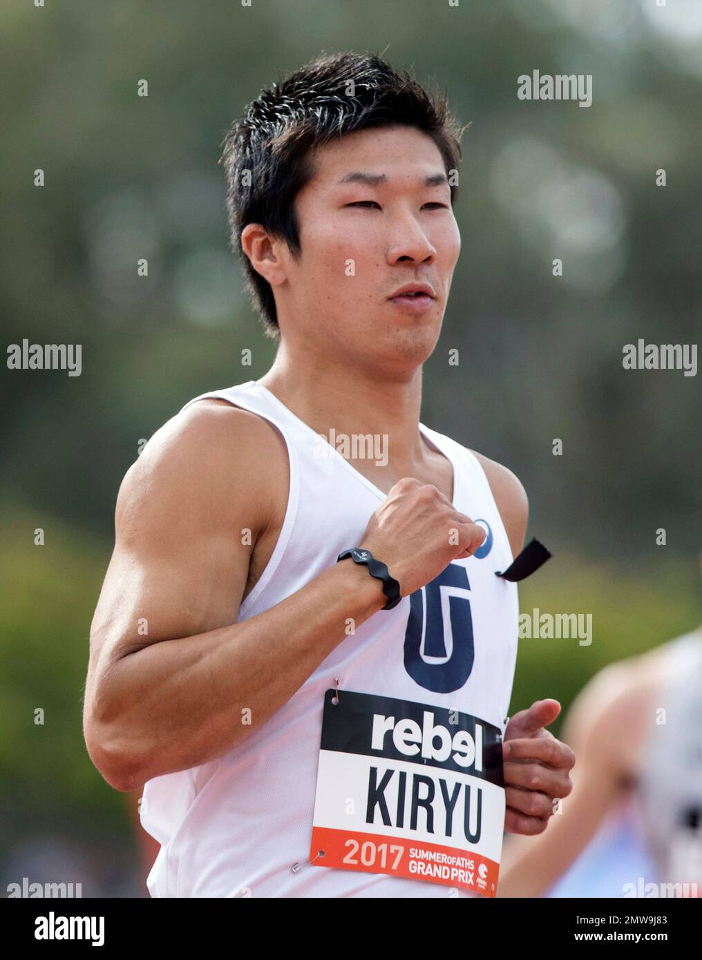 Japan's Yoshihide Kiryu reacts after crossing the finish line in the ...