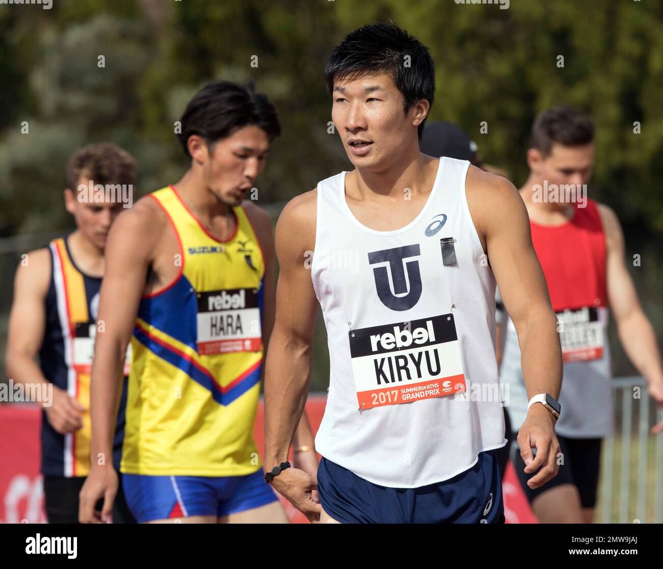 Japan's Yoshihide Kiryu walks after crossing the finish line in the ...