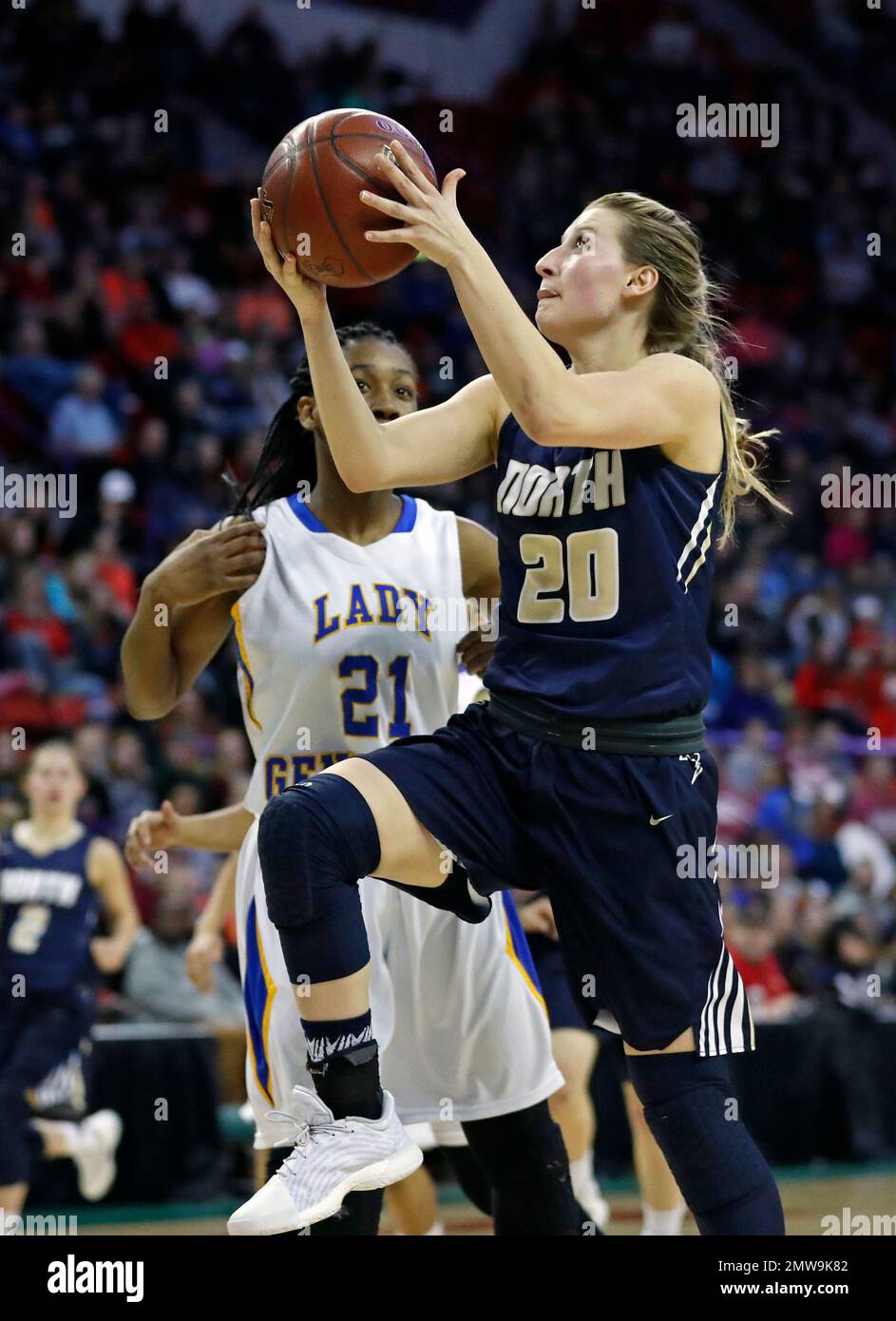 Appleton North's Sydney Levy shoots a layup while being guarded by ...