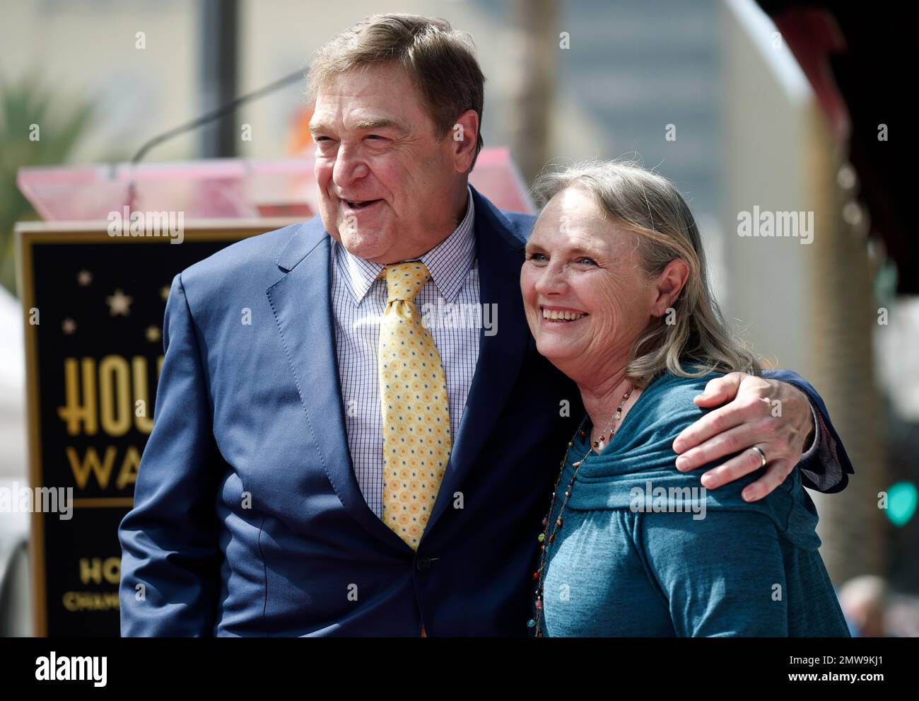 Actor John Goodman, left, poses with actress Tess Harper during a ...