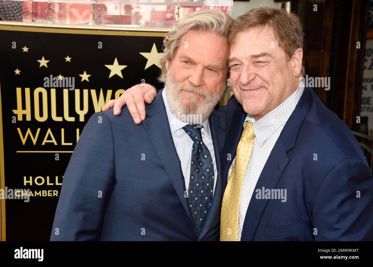 Actors John Goodman, right, and Jeff Bridges pose together during a ...