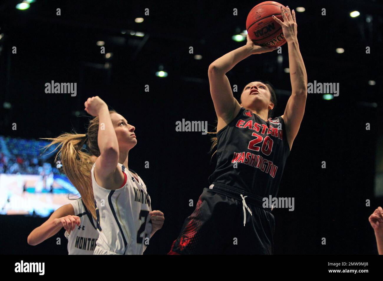 Eastern Washington guard Tisha Phillips (20) shoots in front of Montana ...