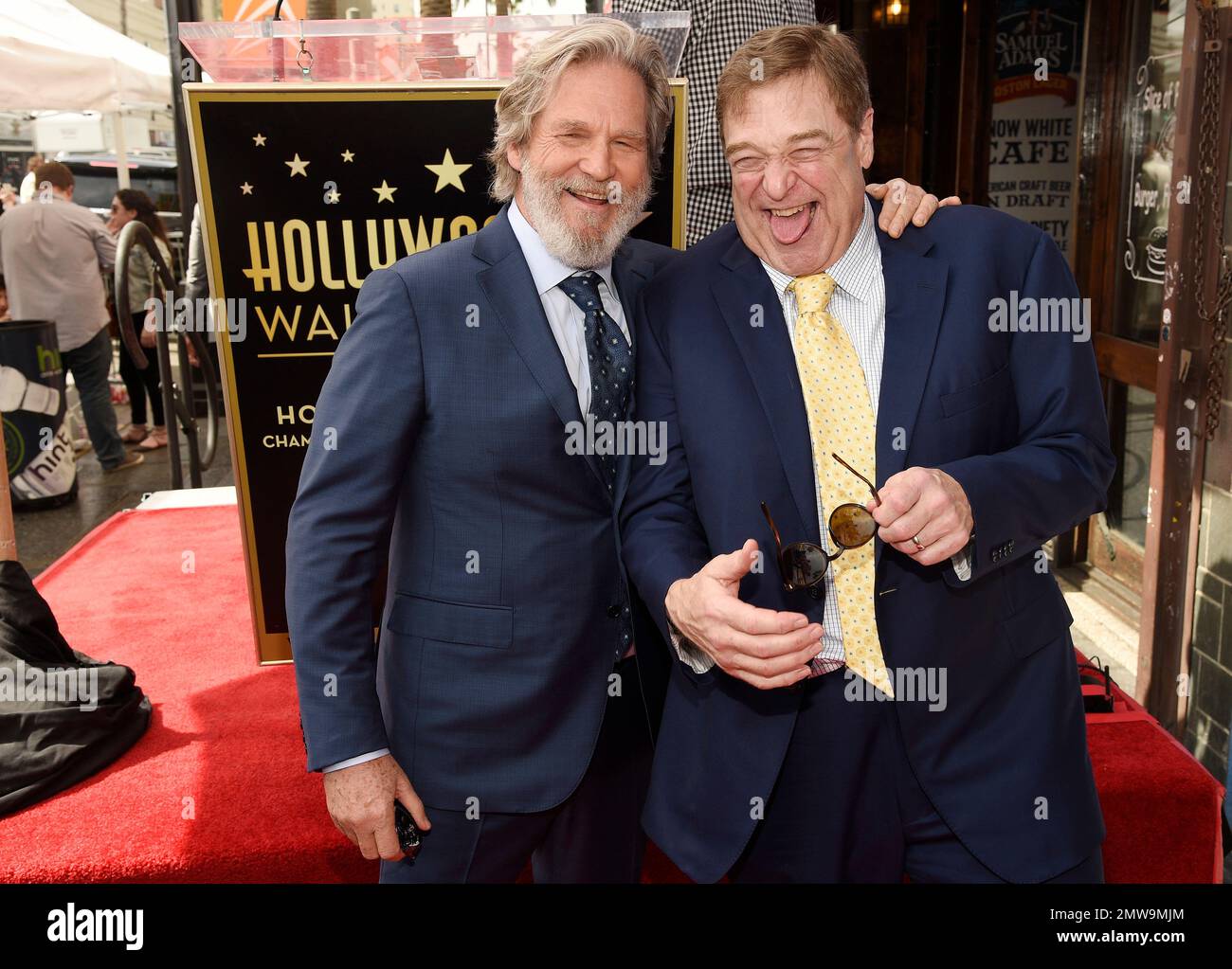 Actors Jeff Bridges, left, and John Goodman laugh following a ceremony ...