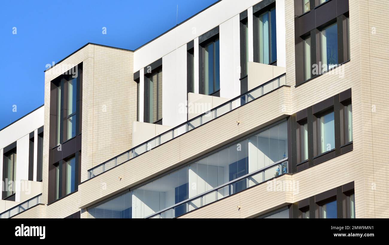 Modern apartment buildings on a sunny day with a blue sky. Facade of a ...