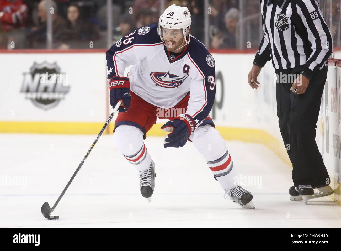 Columbus Blue Jackets center Boone Jenner (38) skates with the puck ...