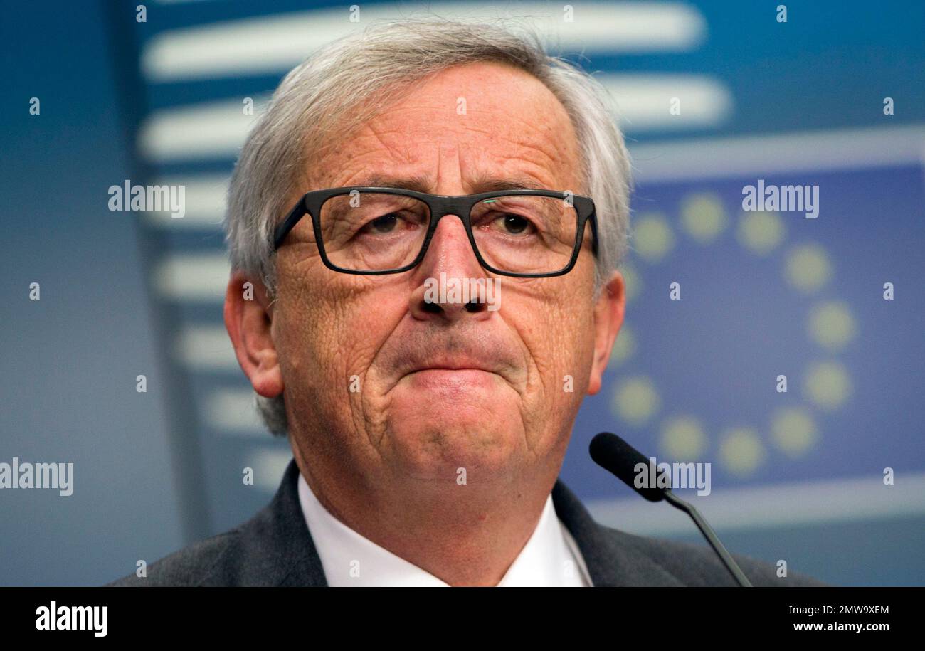 European Commission President Jean-Claude Juncker listens to questions ...