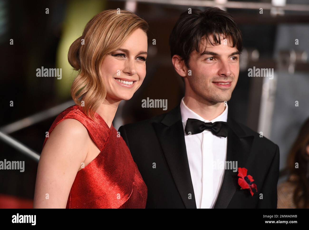Brie Larson, left, and Alex Greenwald arrive at the Los Angeles ...