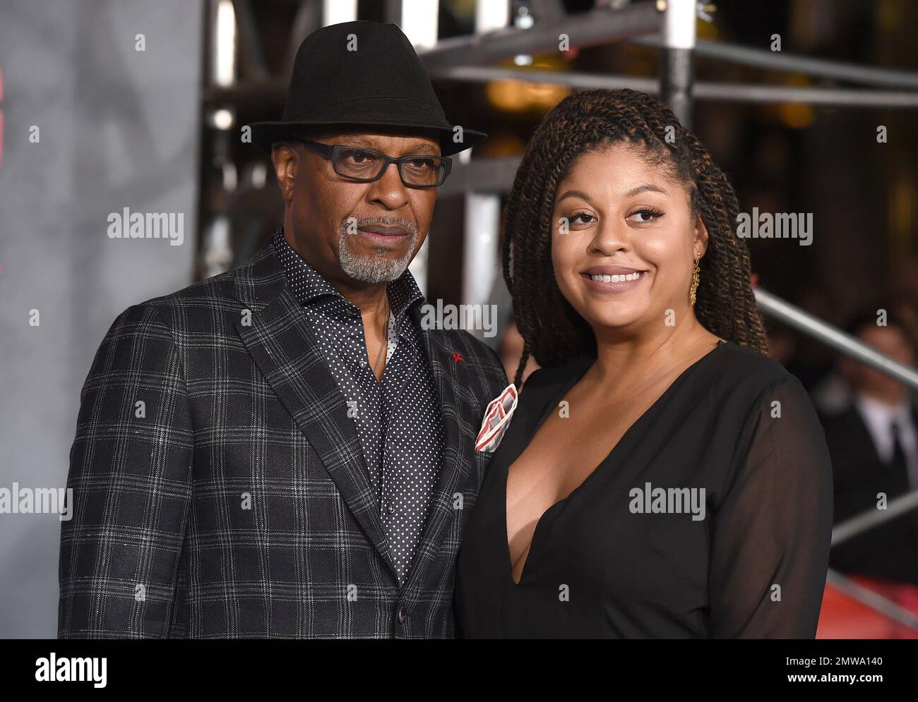 James Pickens Jr., left, and his daughter Gavyn Pickens arrive at the ...