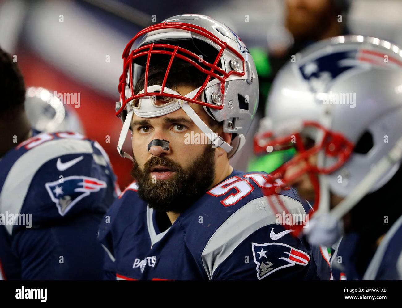New England Patriots linebacker Rob Ninkovich looks on during an NFL ...