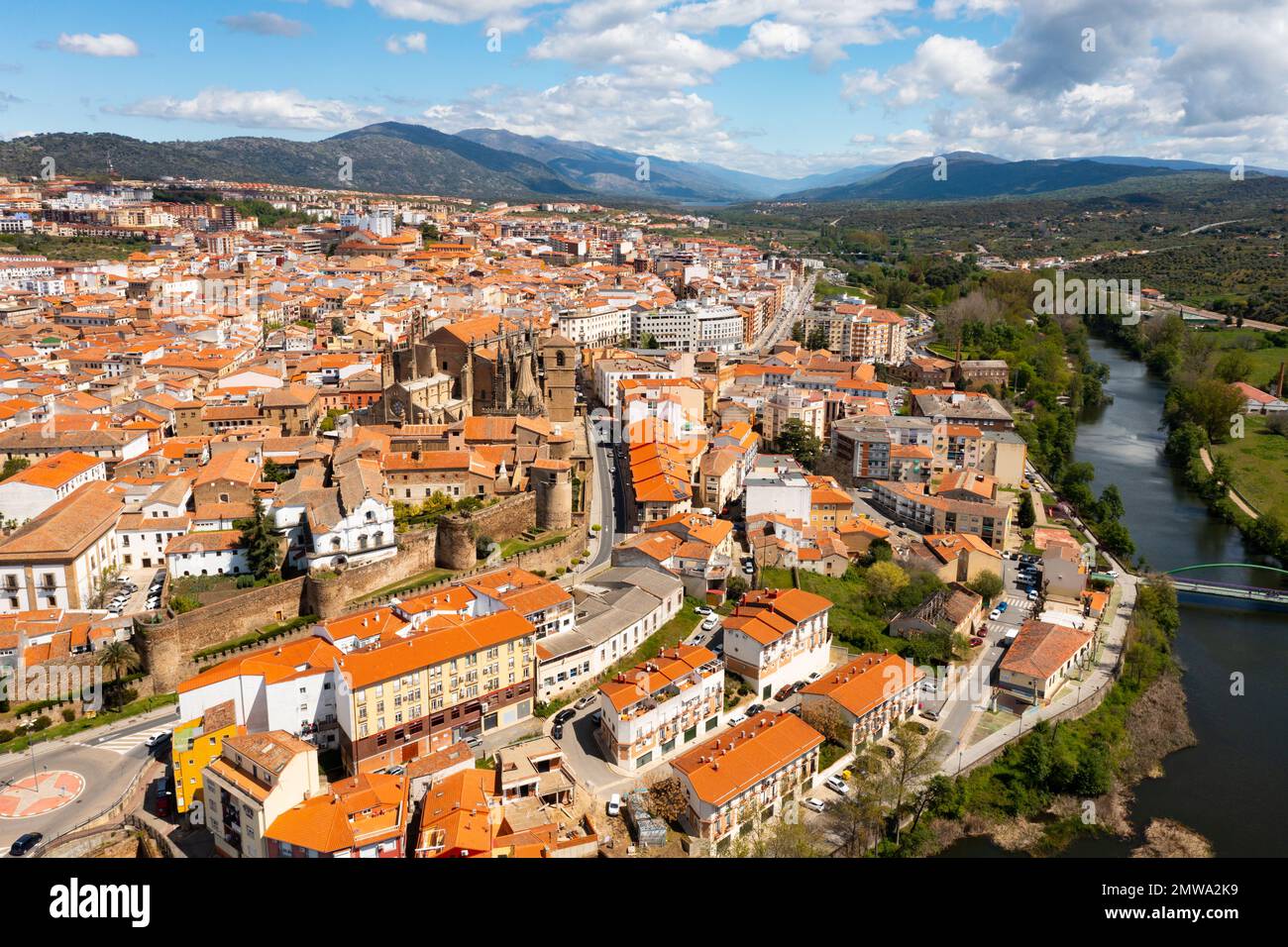 Drone view of Plasencia cityscape with catholic cathedral on Jerte ...