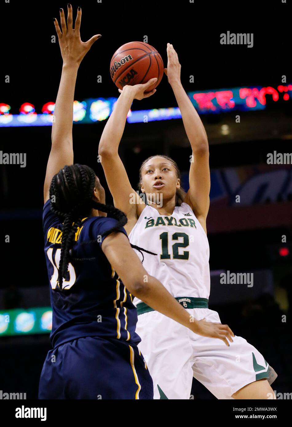 Baylor guard Alexis Prince (12) shoots as West Virginia center Lanay ...