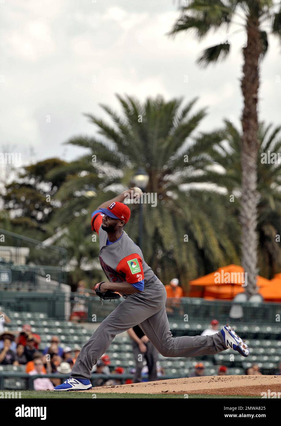 Dominican Republic pitcher Samuel Deduno delivers to the Baltimore ...