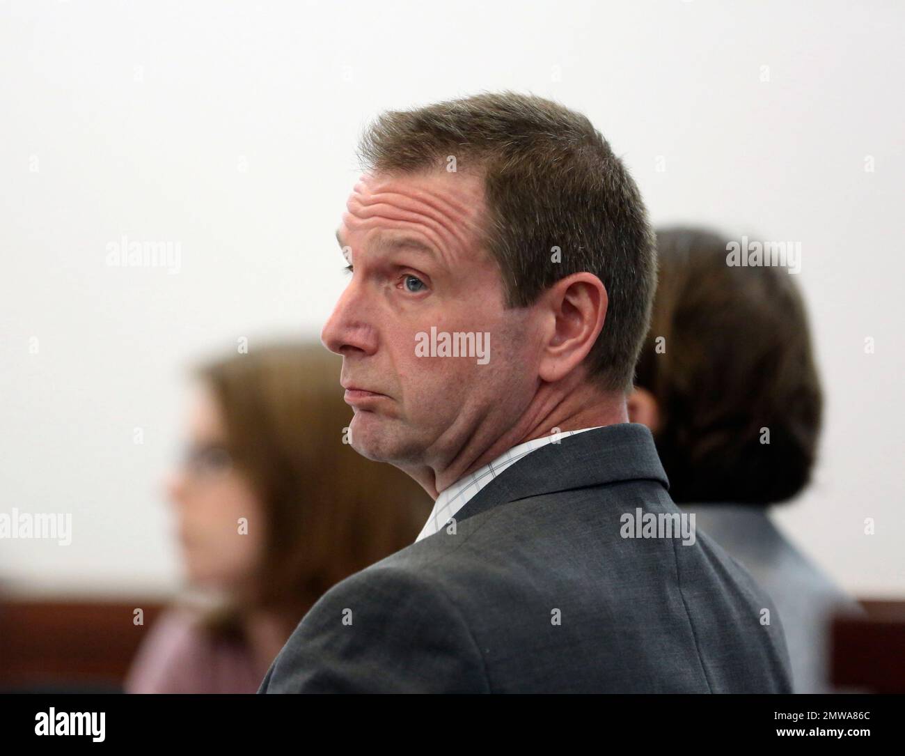Curtis Lovelace looks over at the prosecutors during his first-degree ...