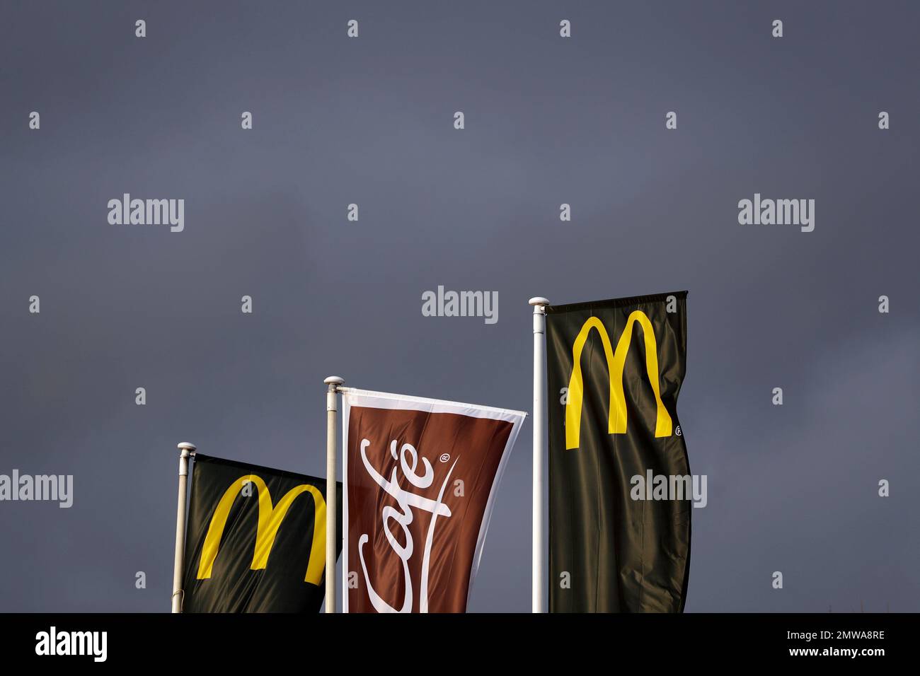 Flags of Fast Food restaurant McDonald's flutter in Herzogenaurach ...