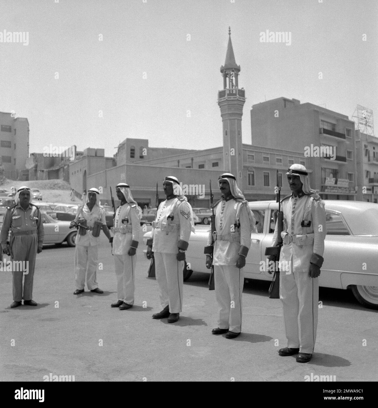 The Arab police guard lined up outside the Seif Palace in Kuwait City ...