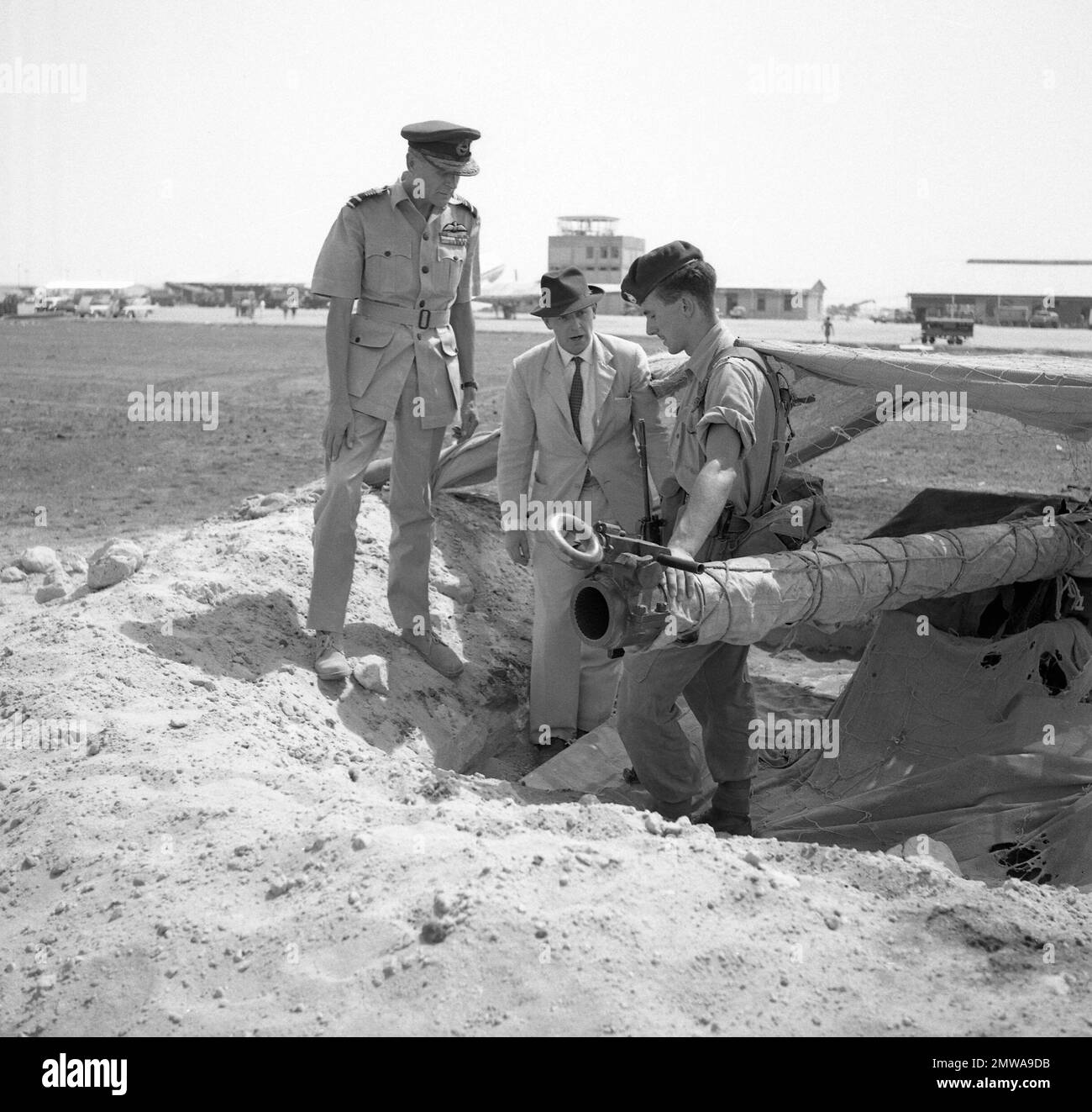 The Undersecretary for War, James Ramsden, chats with Private John ...