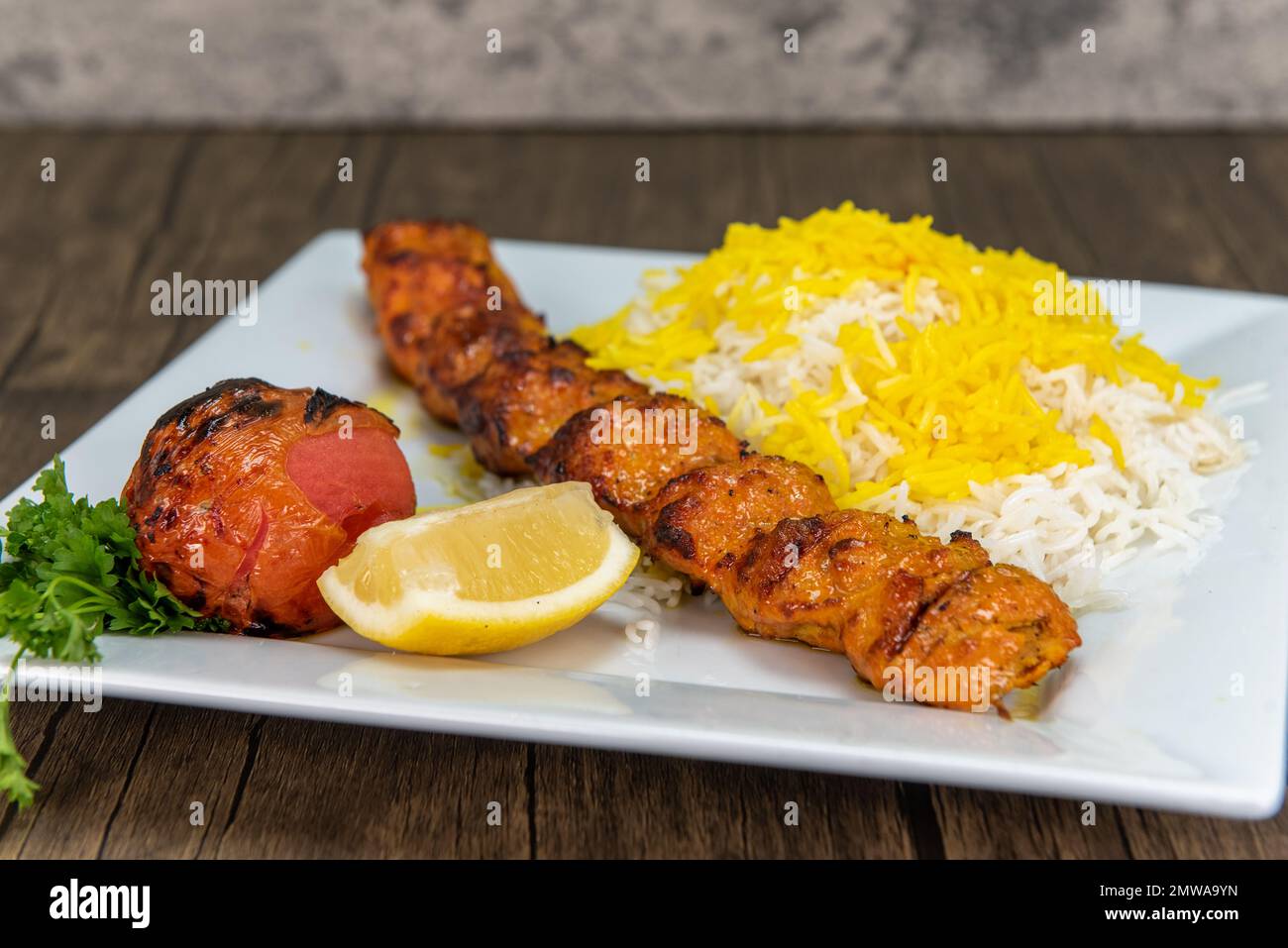 Generous skewer of koobideh chicken, grilled to perfection and seasoned ...