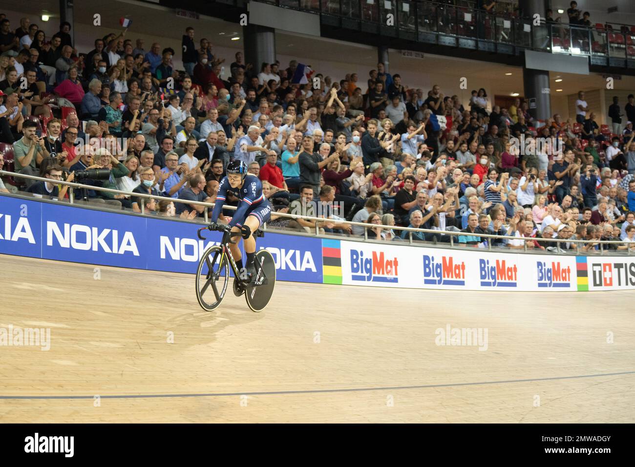 French track cycling fans cheer for Mathilde Gros after she wins the ...