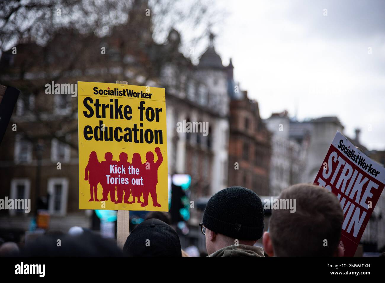 London, UK. 01st Feb, 2023. An activist holds a placard during The ...