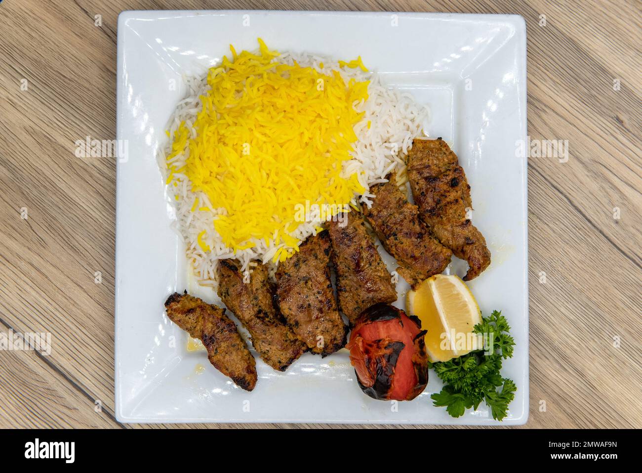 Overhead view of boneless roasted lamb cooked to perfection and ...