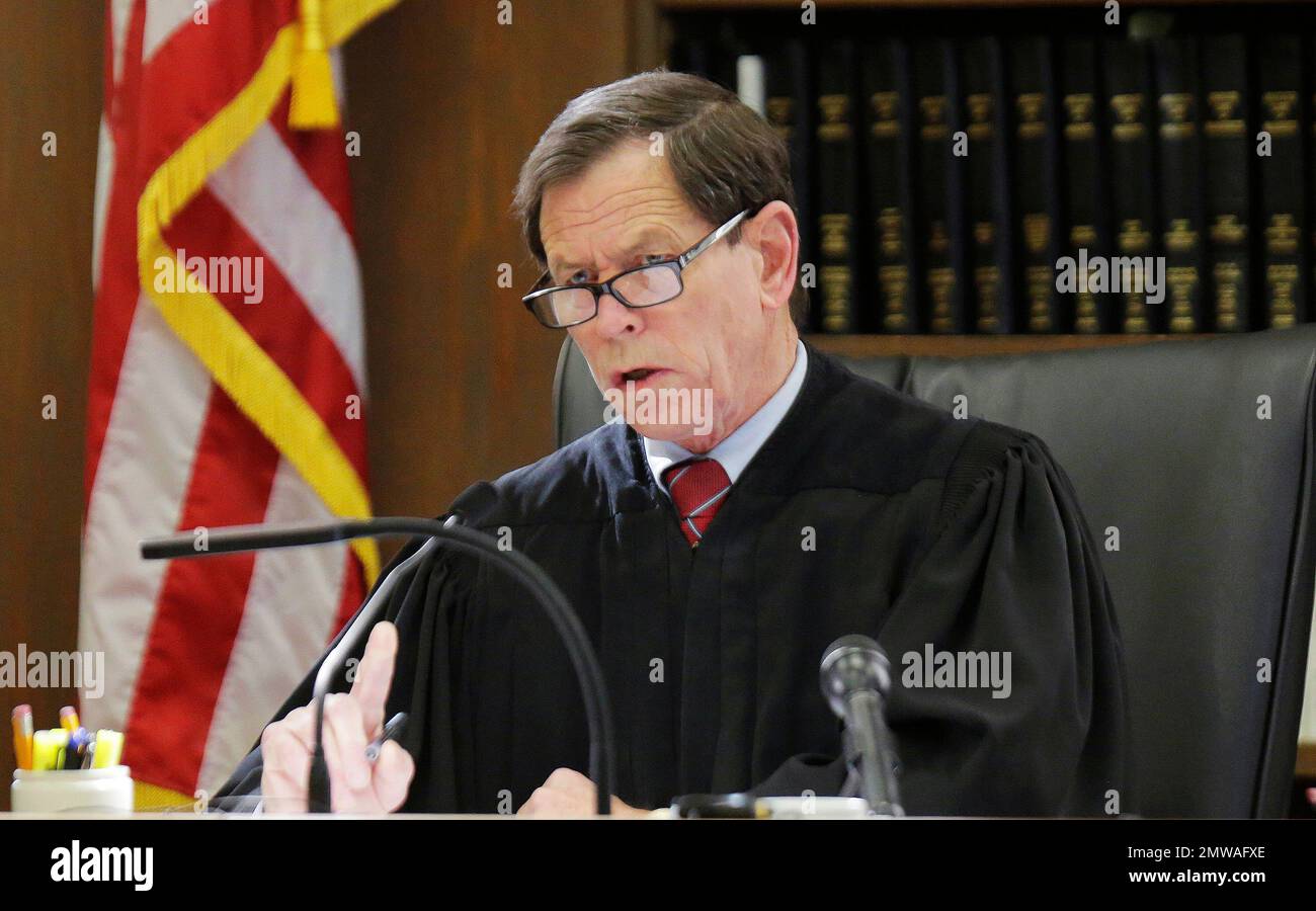 Judge Jeffrey Locke questions defense attorney Ronald Sullivan as he ...