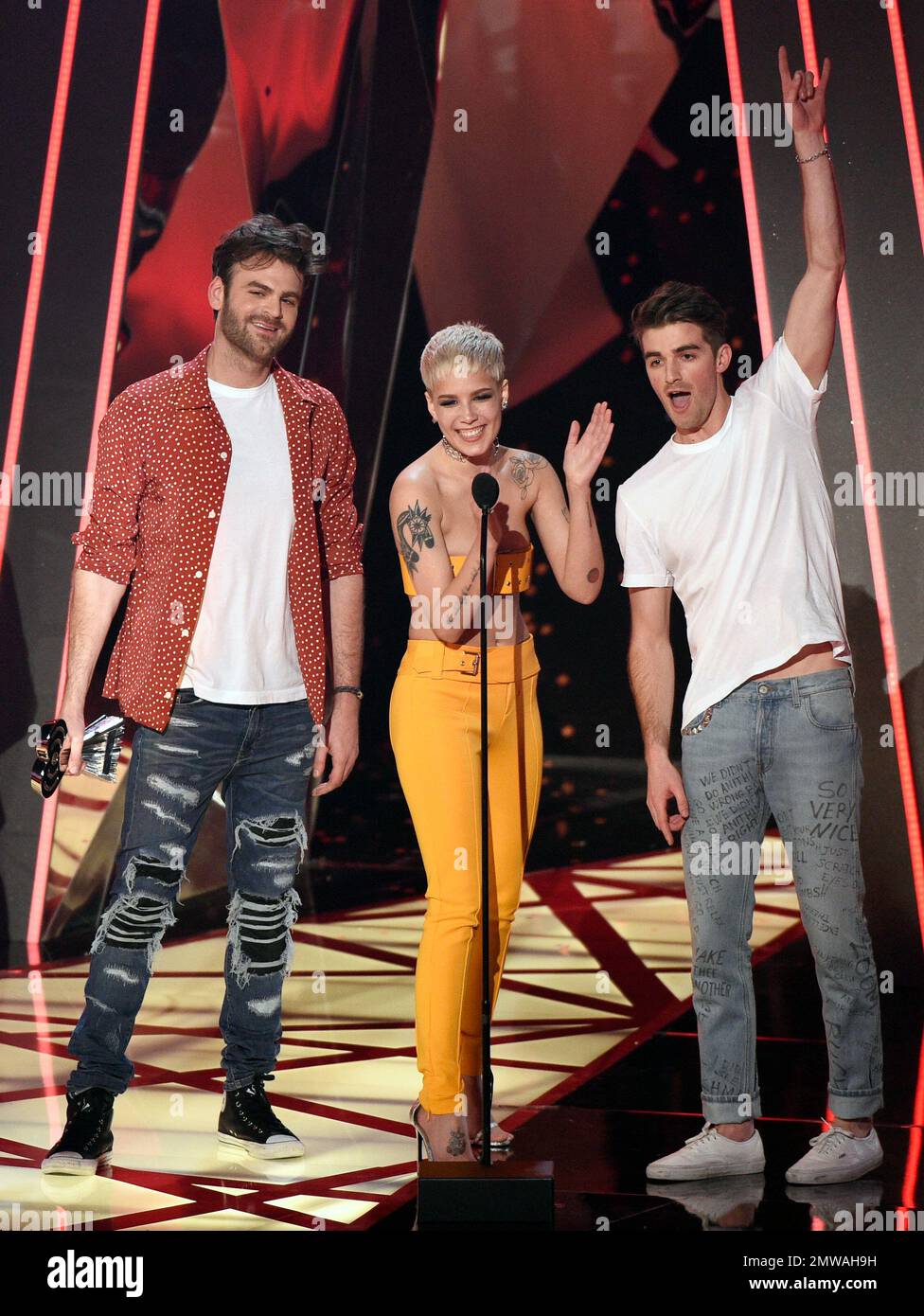 Alex Pall, from left, and Drew Taggart, right, of the Chainsmokers, and ...