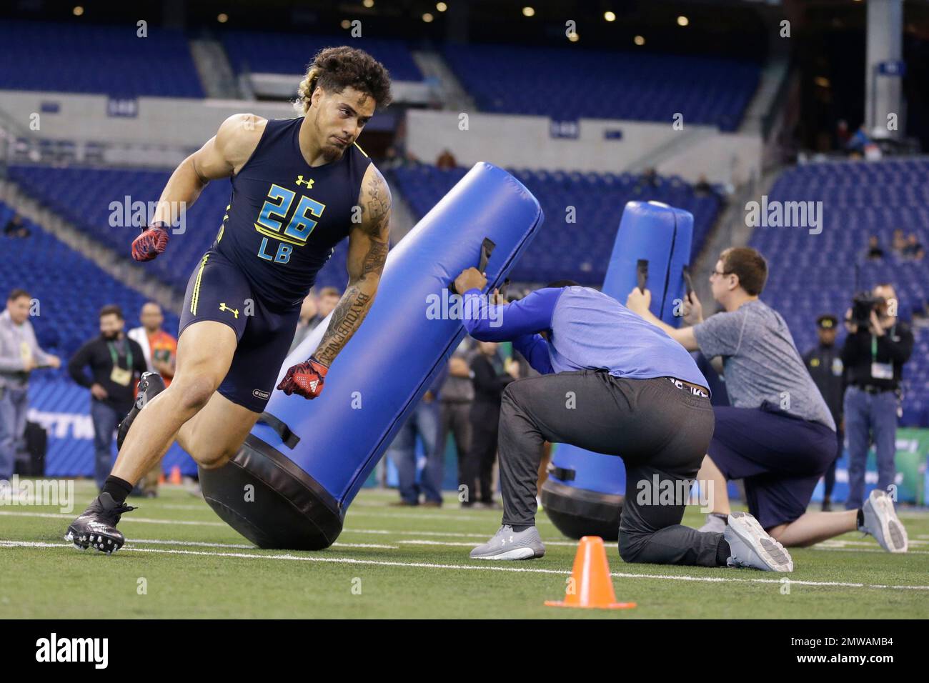 LSU linebacker Duke Riley runs a drill at the NFL football scouting ...