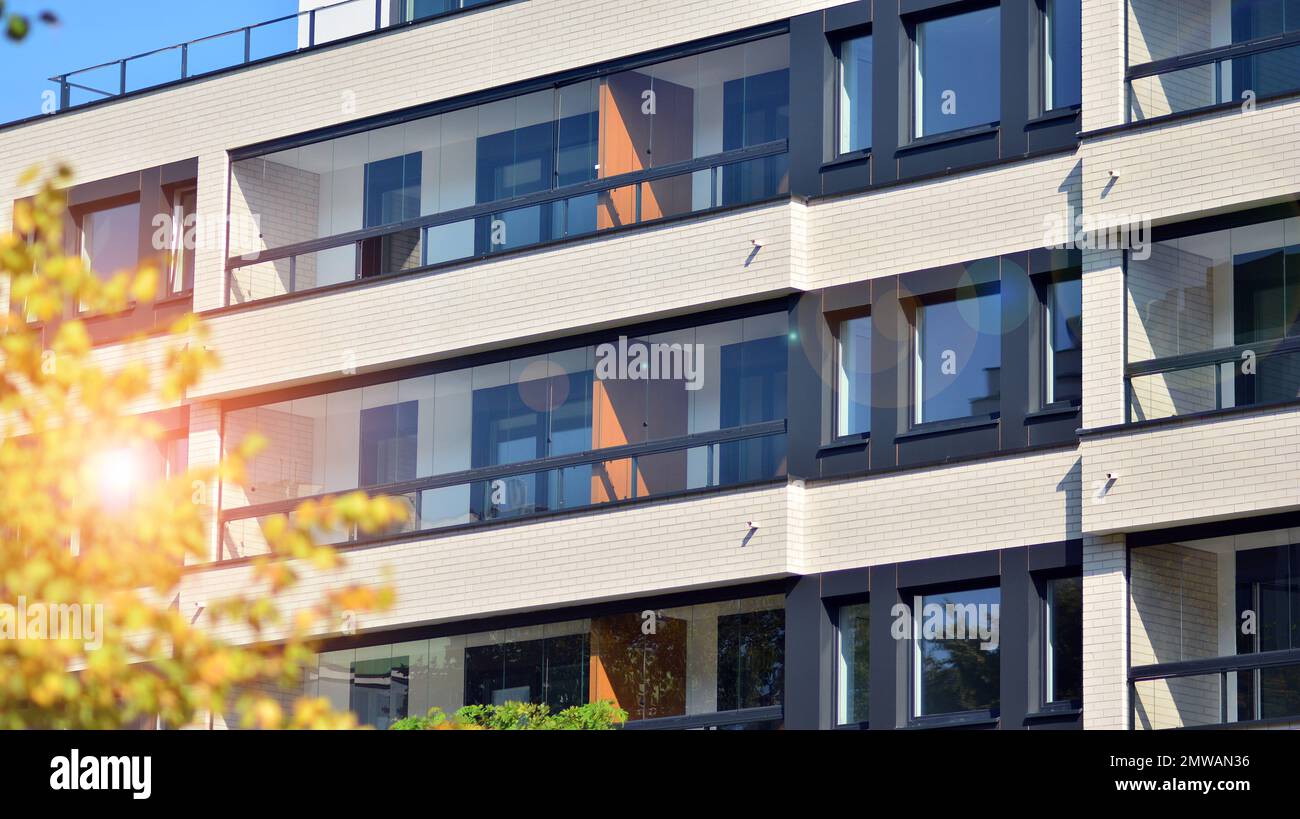 Modern apartment buildings on a sunny day with a blue sky. Facade of a ...