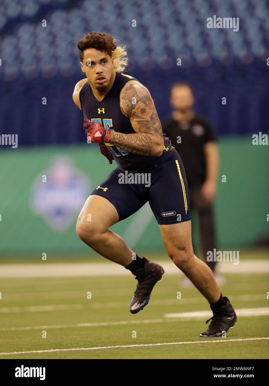 LSU linebacker Duke Riley runs a drill at the NFL football scouting ...