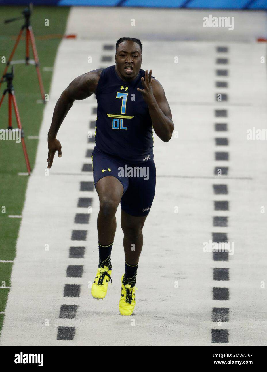 Mississippi defensive end Fadol Brown runs the 40-yard dash at the NFL ...