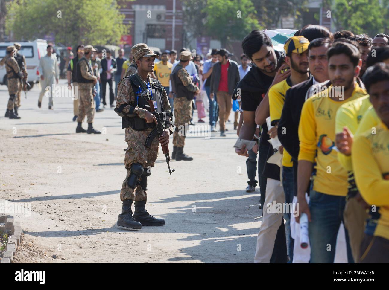 Pakistani army commandos stand guard in the Gaddafi stadium in Lahore ...
