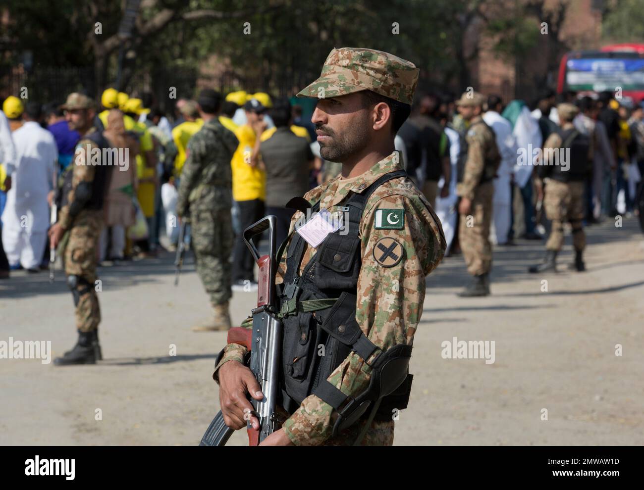 Pakistani army commandos stand guard in the Gaddafi stadium in Lahore ...
